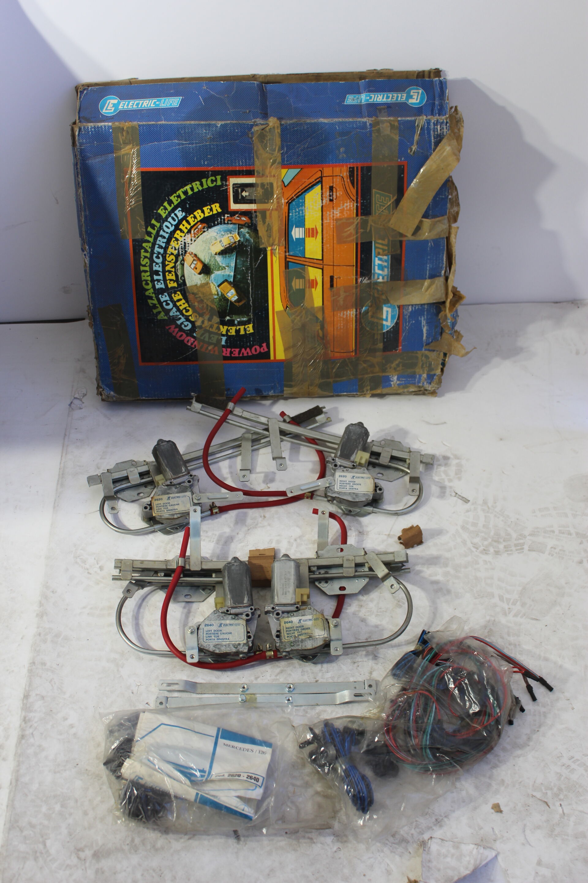 Bonhams Cars : A set of 4, NOS, Bosch electric window lifts for a Mercedes-Benz W126,