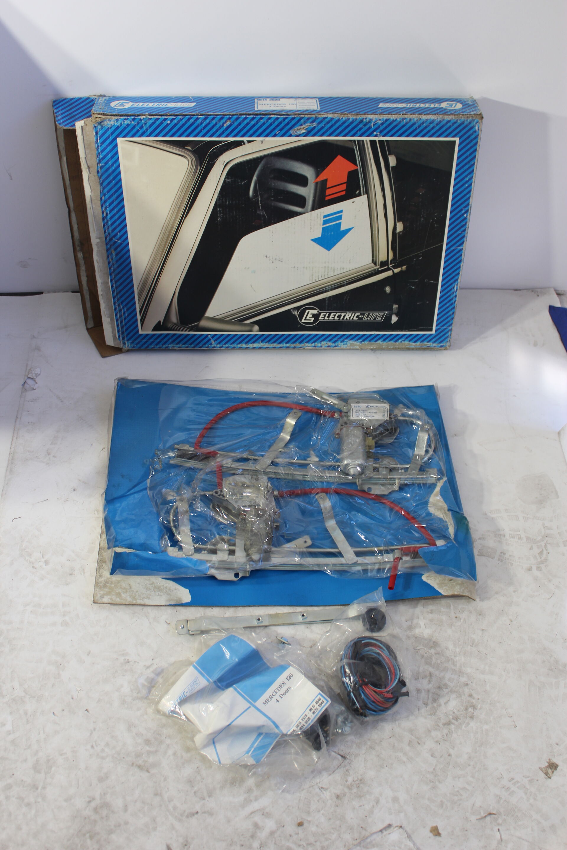 Bonhams Cars : A set of 2, NOS, Bosch electric window lifts for a Mercedes-Benz W126,