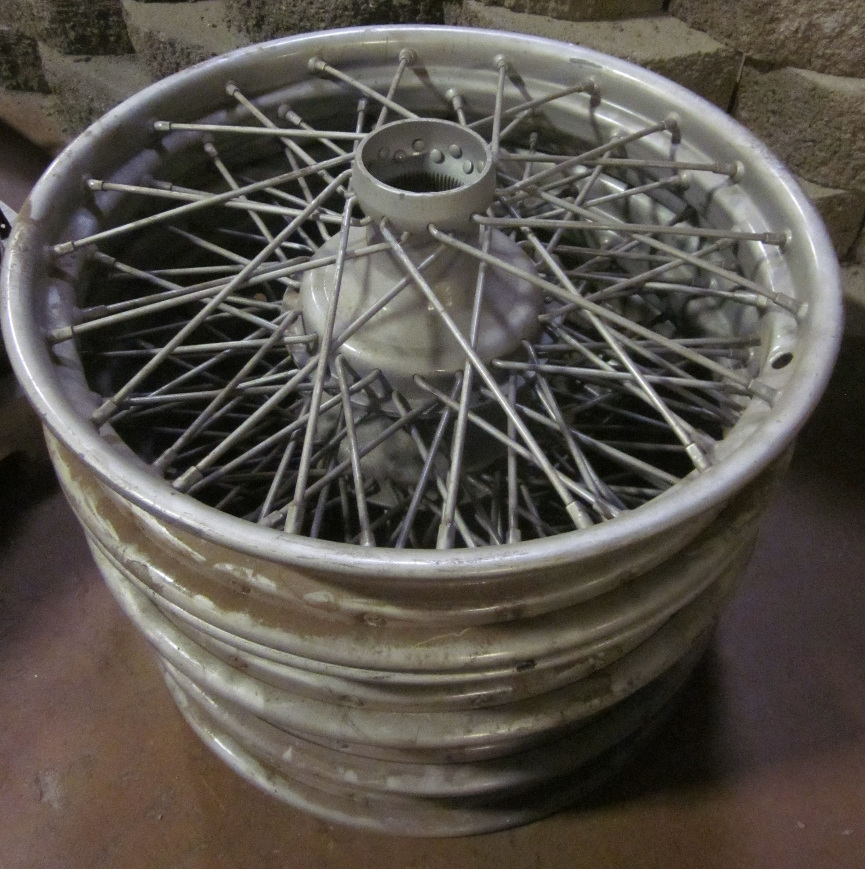 Bonhams Cars : A set of four 18-inch wire wheels,