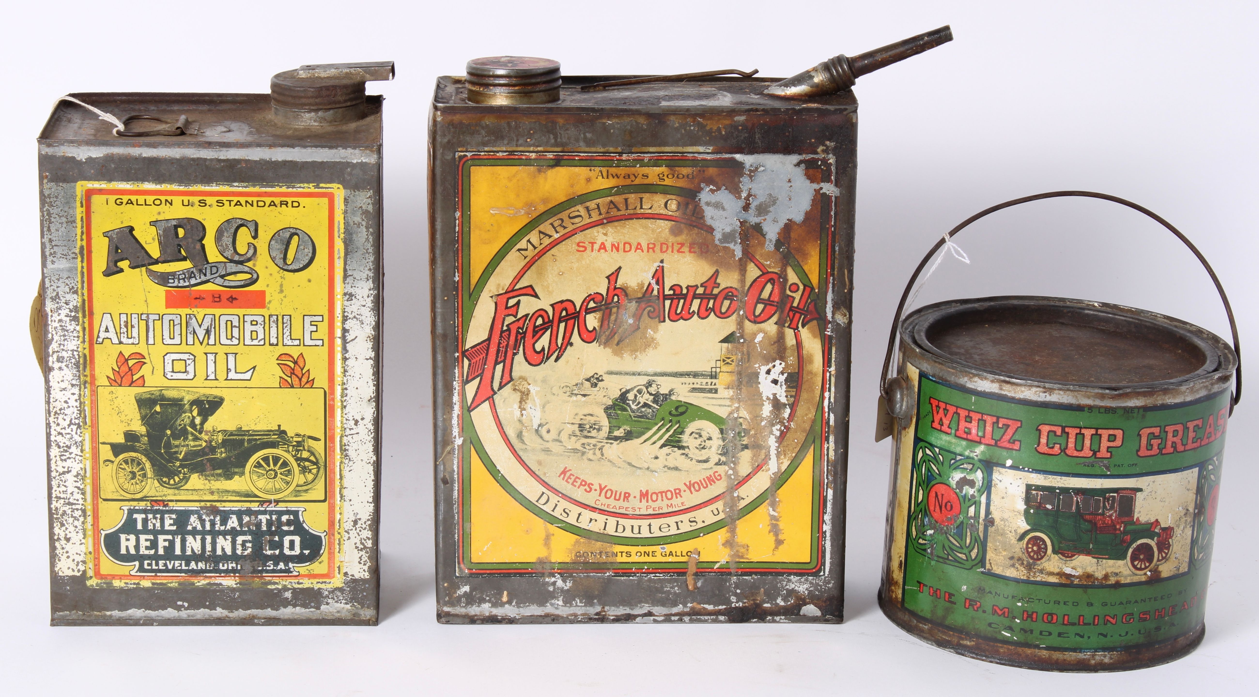 Bonhams Cars : Three decorative Oil and Grease tins, ((3))