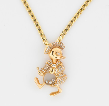 Bonhams : A diamond and 18k gold articulated duck drummer-boy pendant ...