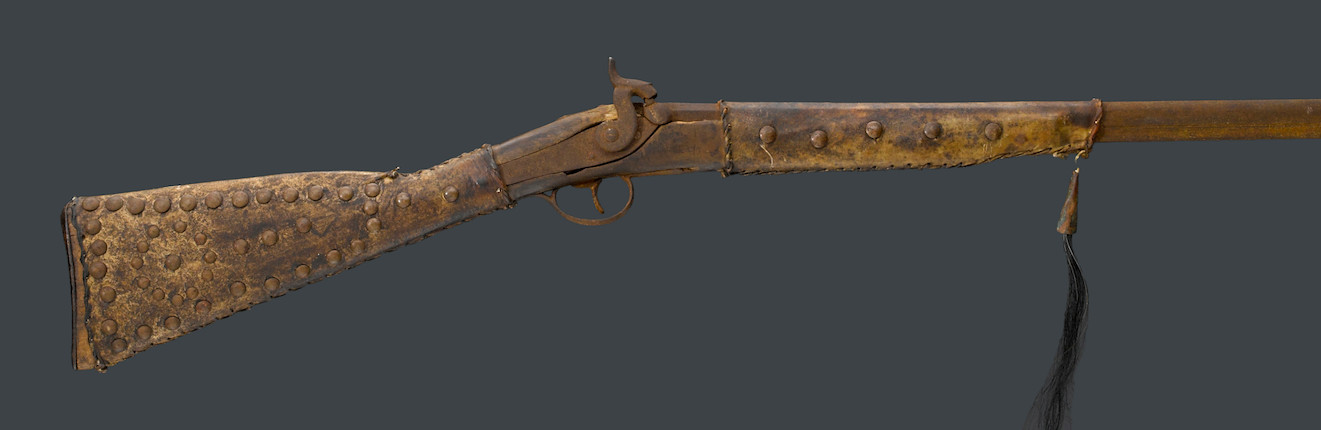 Bonhams : A brass-tacked and rawhide-bound percussion carbine with ...