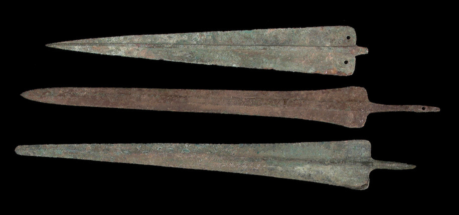 Bonhams : A lot of three large Persian Bronze Age dagger blades/spearheads