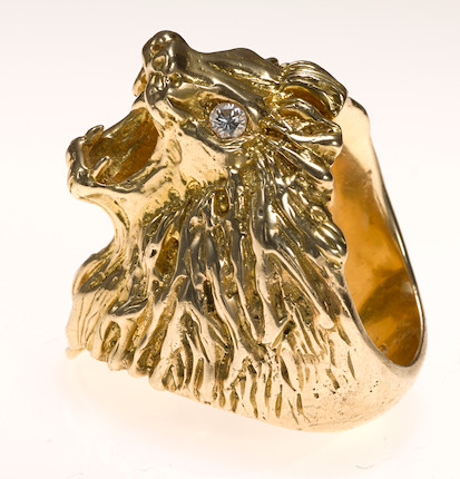 Bonhams : A 14k gold lion ring with diamond eyes