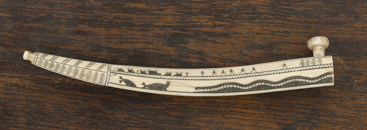 Bonhams : An Eskimo ivory scrimshaw pipe