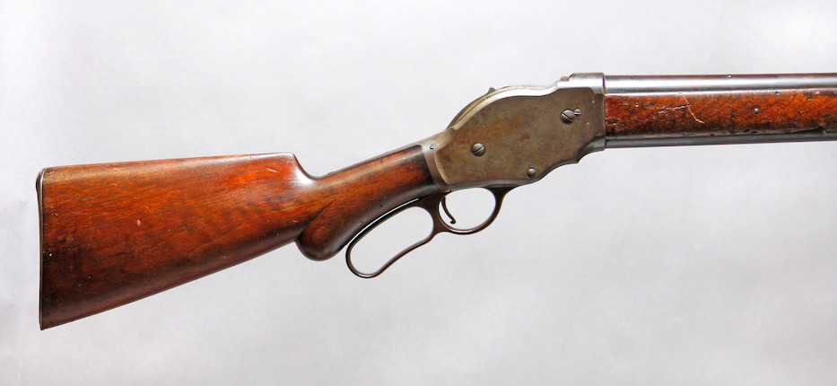 Bonhams : A 12 gauge Winchester Model 1887 lever action shotgun