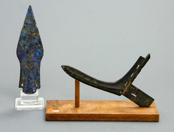 Bonhams : Two archaic cast metal weapons