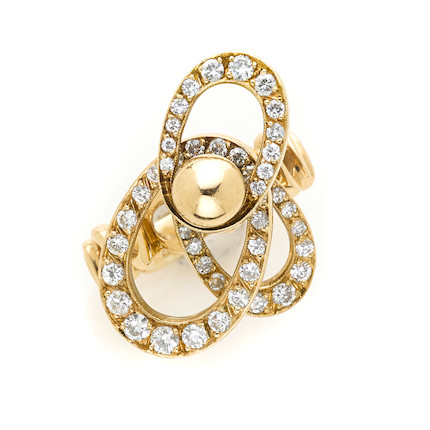 Bonhams : A diamond and 14k gold swinger ring