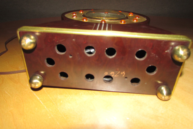 Bonhams : A Lackner Neon Clock 1930s deep maroon case, the dial ...