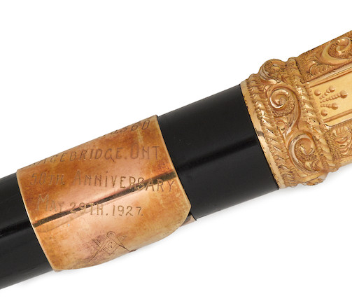 Bonhams : An American 14k gold and gold quartz headed cane and a 10k ...