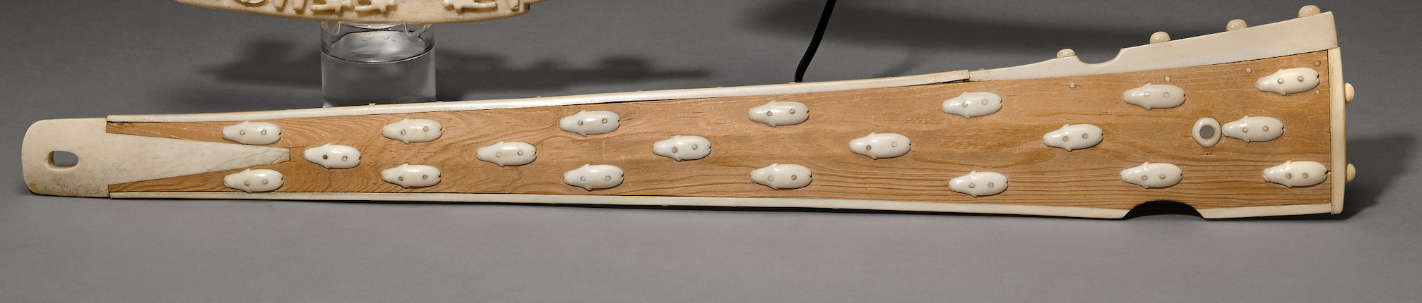 Bonhams : A Greenland Inuit harpoon throwing board