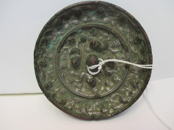 Bonhams : A group of three early mirrors Tang dynasty