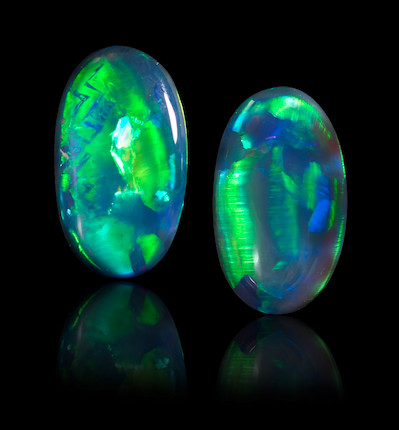Bonhams : Pair of Black Opals with Pseudo Cat's Eye Effect and Chinese ...