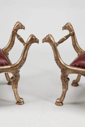 Bonhams : A PAIR OF SILVERED WOOD CAMEL FORM BENCHES