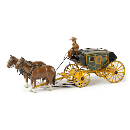 Bonhams Skinner : Carved Stagecoach Figures, United States, c. 1930.