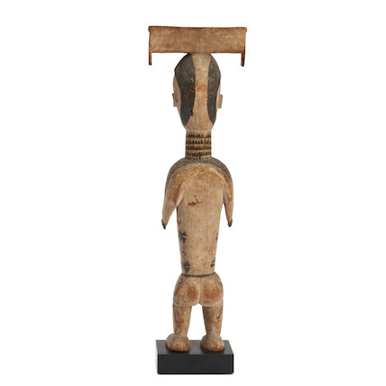 Bonhams Skinner : An Ibibio painted female figure ht. 20 1/2 in.