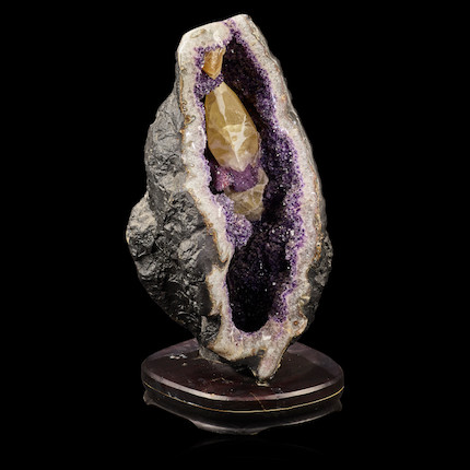 Bonhams : Tall Amethyst Quartz Geode with Pierced Holes and Calcite ...
