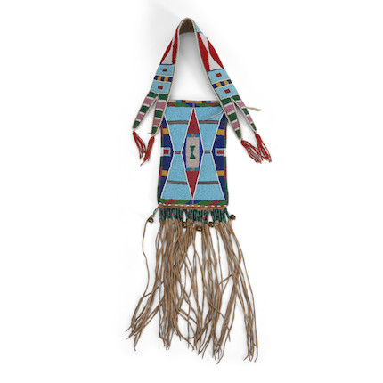 Bonhams Skinner : An Apsáalooke (Crow) beaded hide mirror bag lg. incl ...