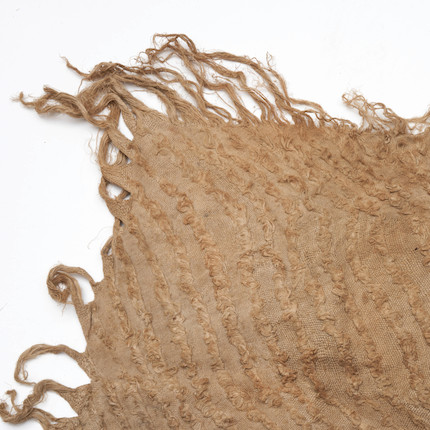 Bonhams Skinner : A Maori rain cape Pake 28 1/2 x 56 1/2 in.