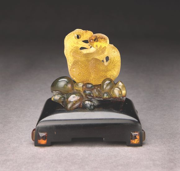 Bonhams : Amber Gecko Carving with Insect Inclusion