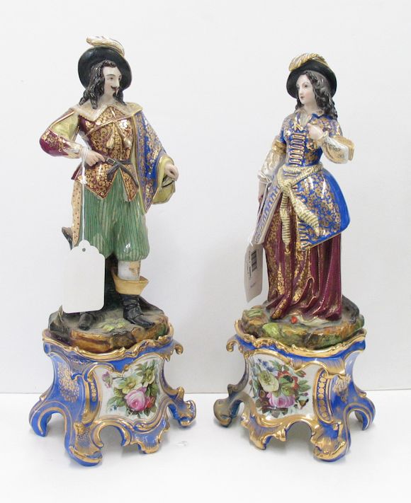 Bonhams : A pair of Continental porcelain colonge bottle figures on stands