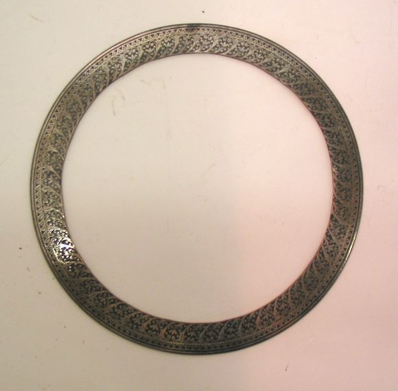 Bonhams : A scarce silver damascened Sikh chakram