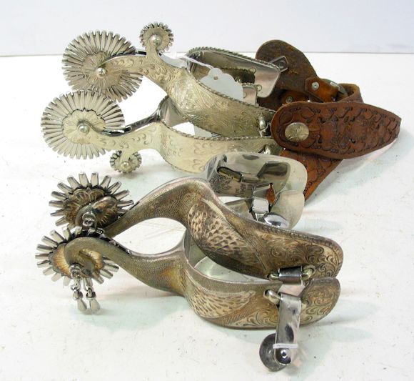 Bonhams : A lot of two pairs of silver-mounted western spurs