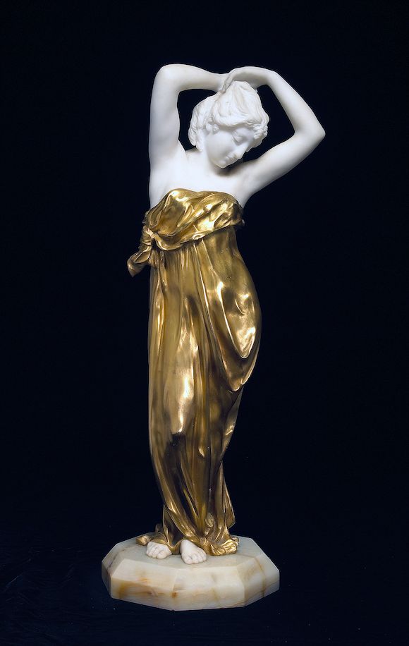 Bonhams : A gilt bronze and marble figure of a maiden Cast after a ...
