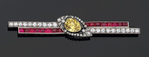 Bonhams : A natural fancy color diamond, diamond, ruby and platinum brooch
