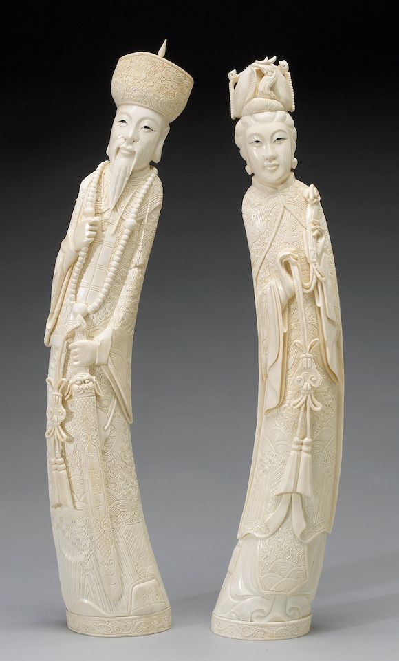 Bonhams : A pair of large Chinese ivory tusk carvings of an emperor and ...