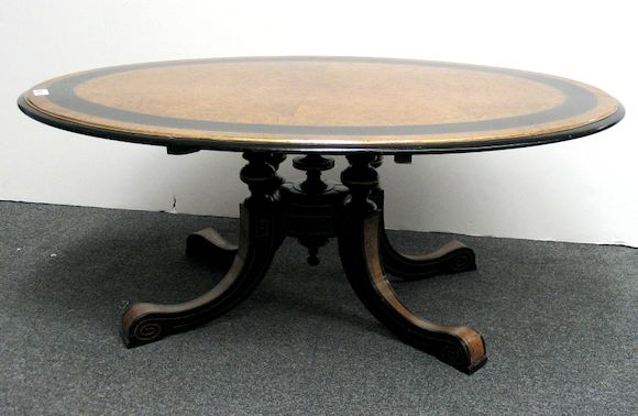 Bonhams : A Renaissance Revival parcel ebonized yew wood oval low table