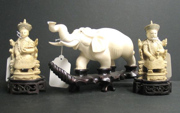 Bonhams : Three ivory studies, including a small pair of seated emperor ...