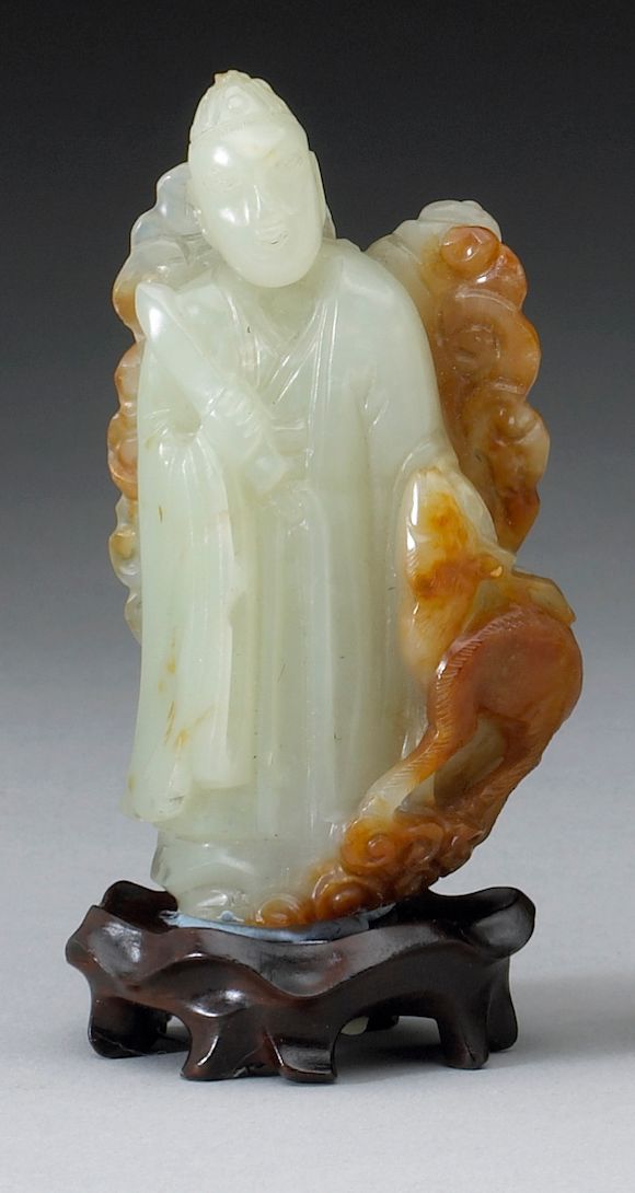 Bonhams : A nephrite carving of an immortal 19th Century