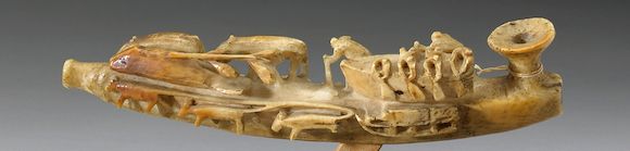 Bonhams : An Eskimo ivory pipe