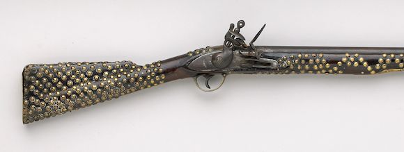 Bonhams : A British flintlock Land Pattern musket with brass tacked ...