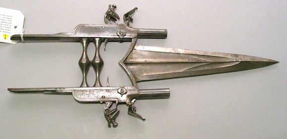 Bonhams : An Indian katar mounted with percussion pistols