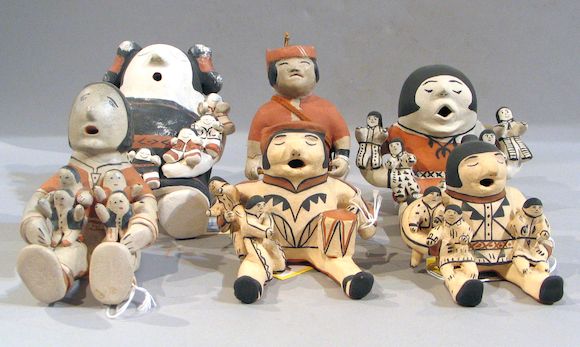 Bonhams : Five Cochiti storyteller dolls and a Zuni archer figure