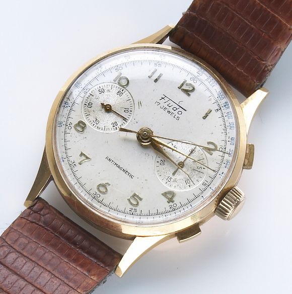 Bonhams : A Fludo, Swiss gold chronograph, leather strap wristwatch,