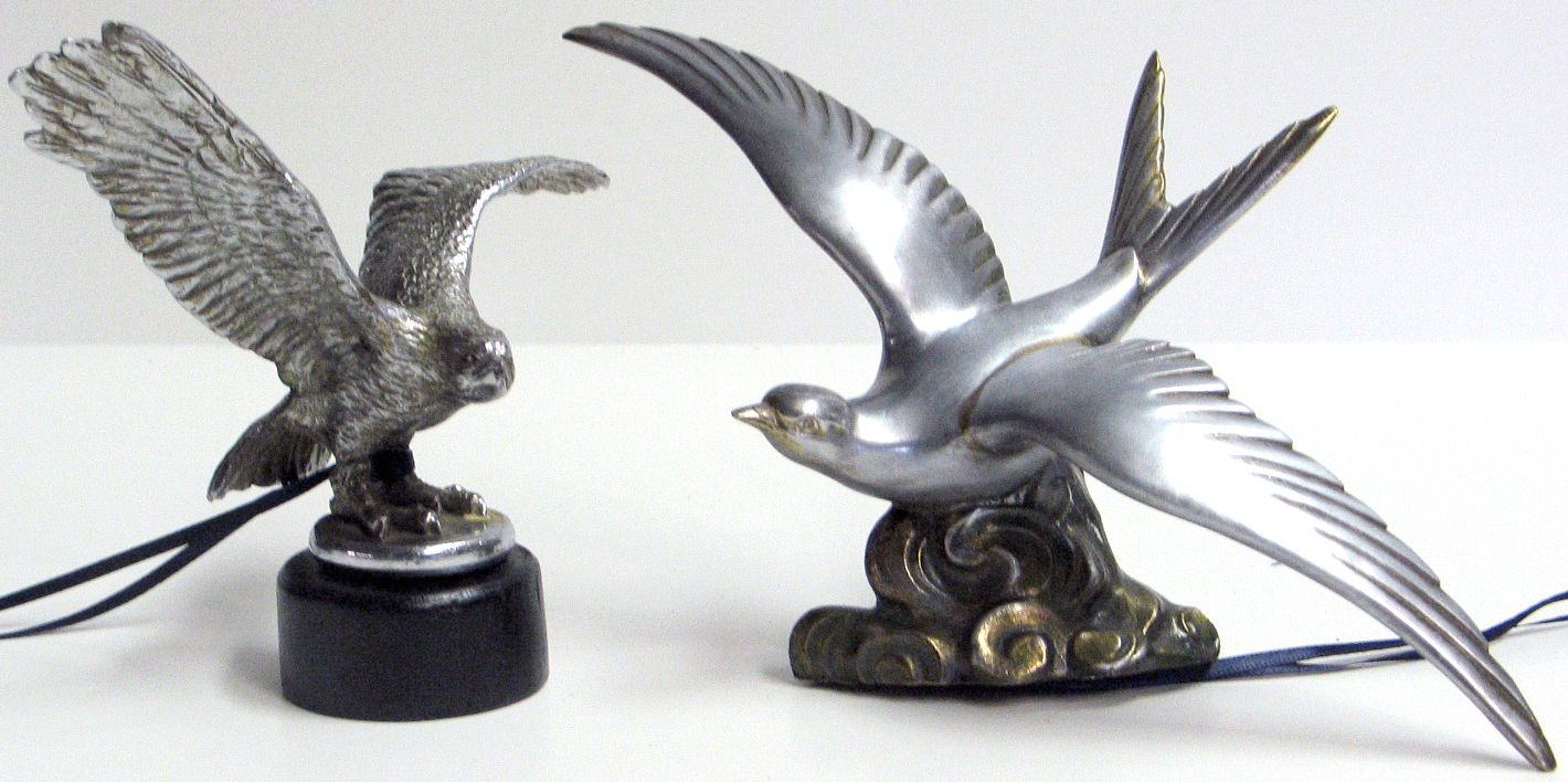 Bonhams Cars : Two bird mascots, Wingspan 9½ ins