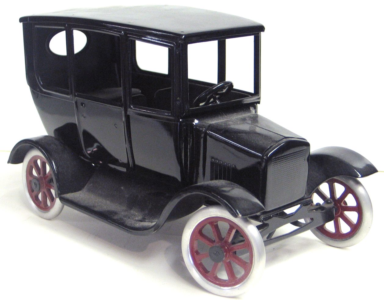 Bonhams Cars : A Cow Dery pressed steel ‘T’ sedan,