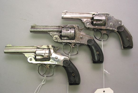 Bonhams : A lot of three Smith & Wesson .38 caliber top break revolvers