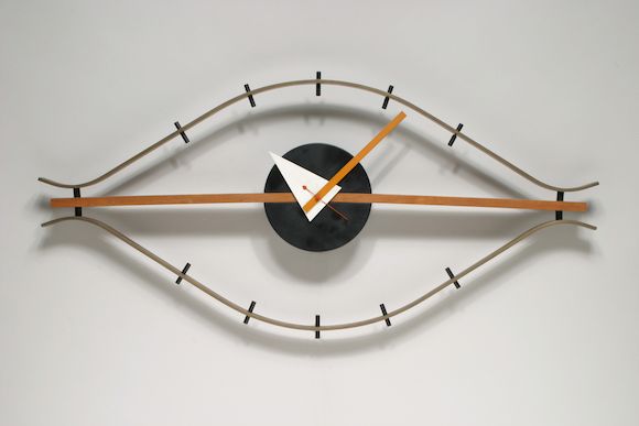 Bonhams : A good George Nelson walnut and brass 'eye' clock