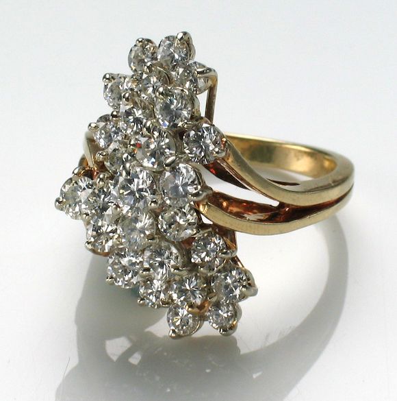 Bonhams : A diamond and 14k gold waterfall cluster ring