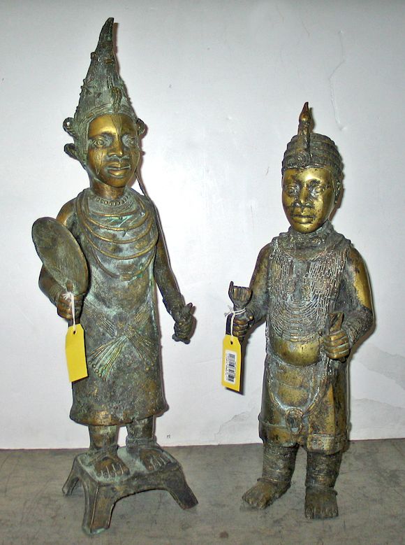 Bonhams : Two Benin bronze figures of a king and queen