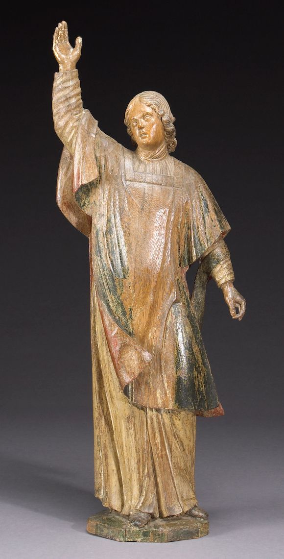 Bonhams : A Northern European carved oak and polychrome figure of a deacon