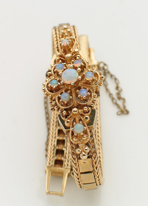 Bonhams : Jean Revlin / Ebel. A Lady's 14k gold bracelet watch with ...