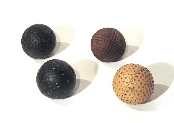 Bonhams : Four very small-sized balls,