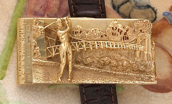 Bonhams : An ornate solid gold money clip of a golfer by a suspension ...