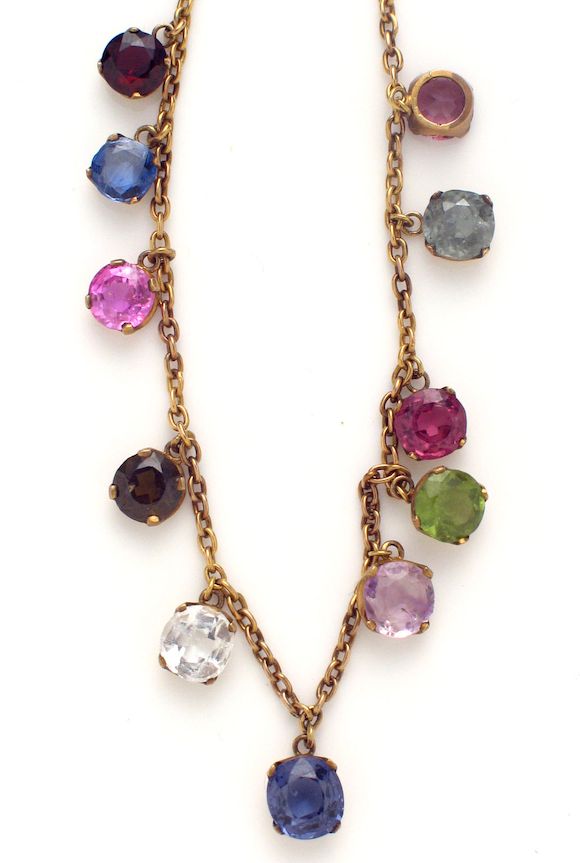 Bonhams : A gemstone and ten karat gold necklace