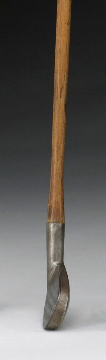 Bonhams : A Spalding ‘Model C’ left-handed spring-faced iron,